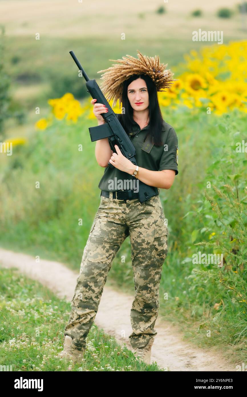Female soldier in military uniform. A girl in a military uniform with a ...
