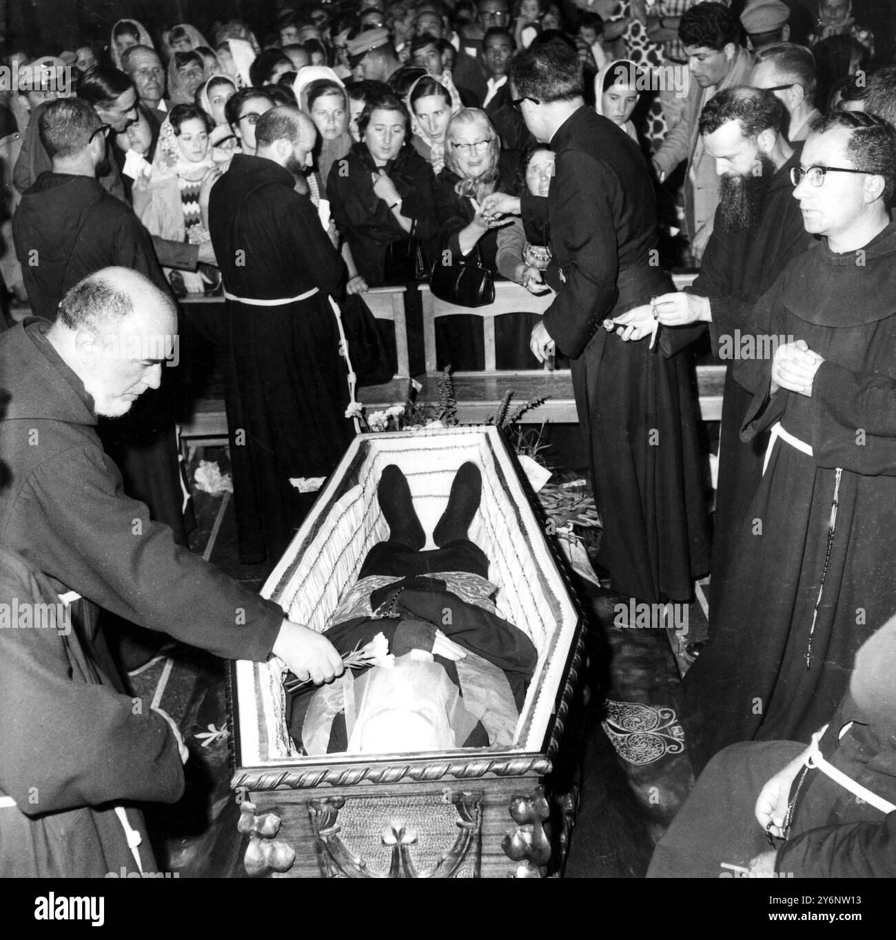 The faithful crowding round to pay their last respects to Padre Pio of ...