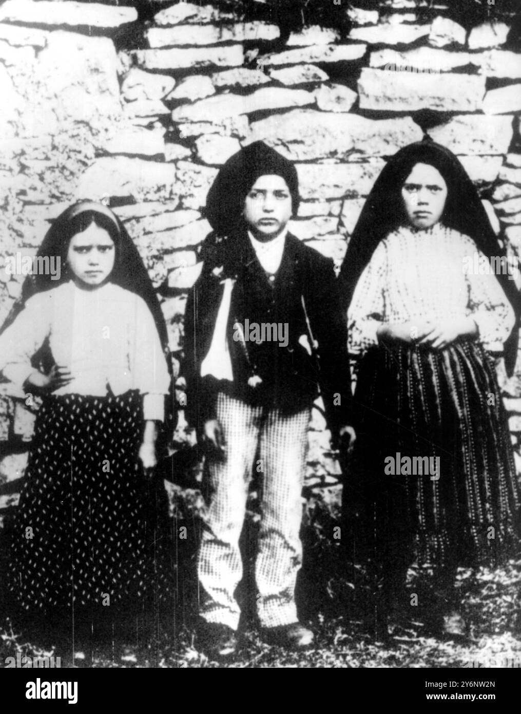 The three shepherd children who saw the Virgin Mary appear in 1917. l-r ...