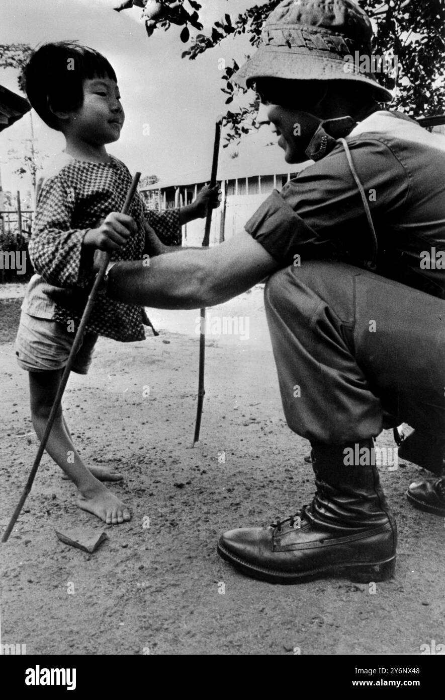Girl walking under arms Black and White Stock Photos & Images - Alamy
