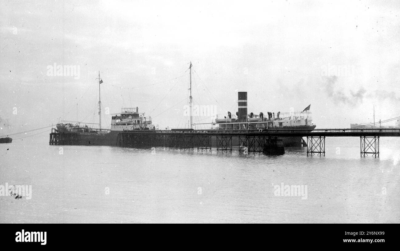 Berthed oil tanker Black and White Stock Photos & Images - Alamy
