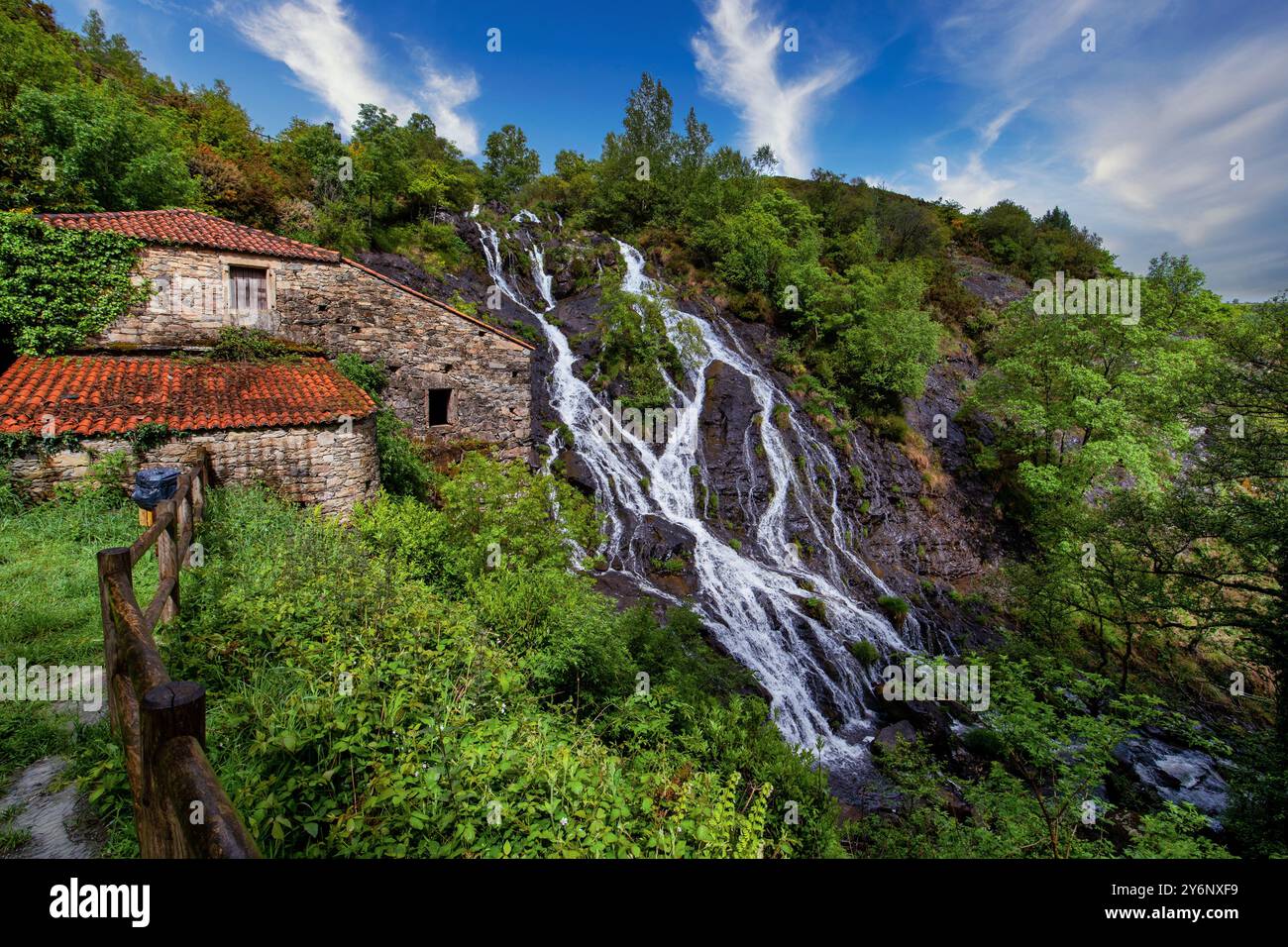 A traditional house near to a river fall in Galicia Stock Photo - Alamy
