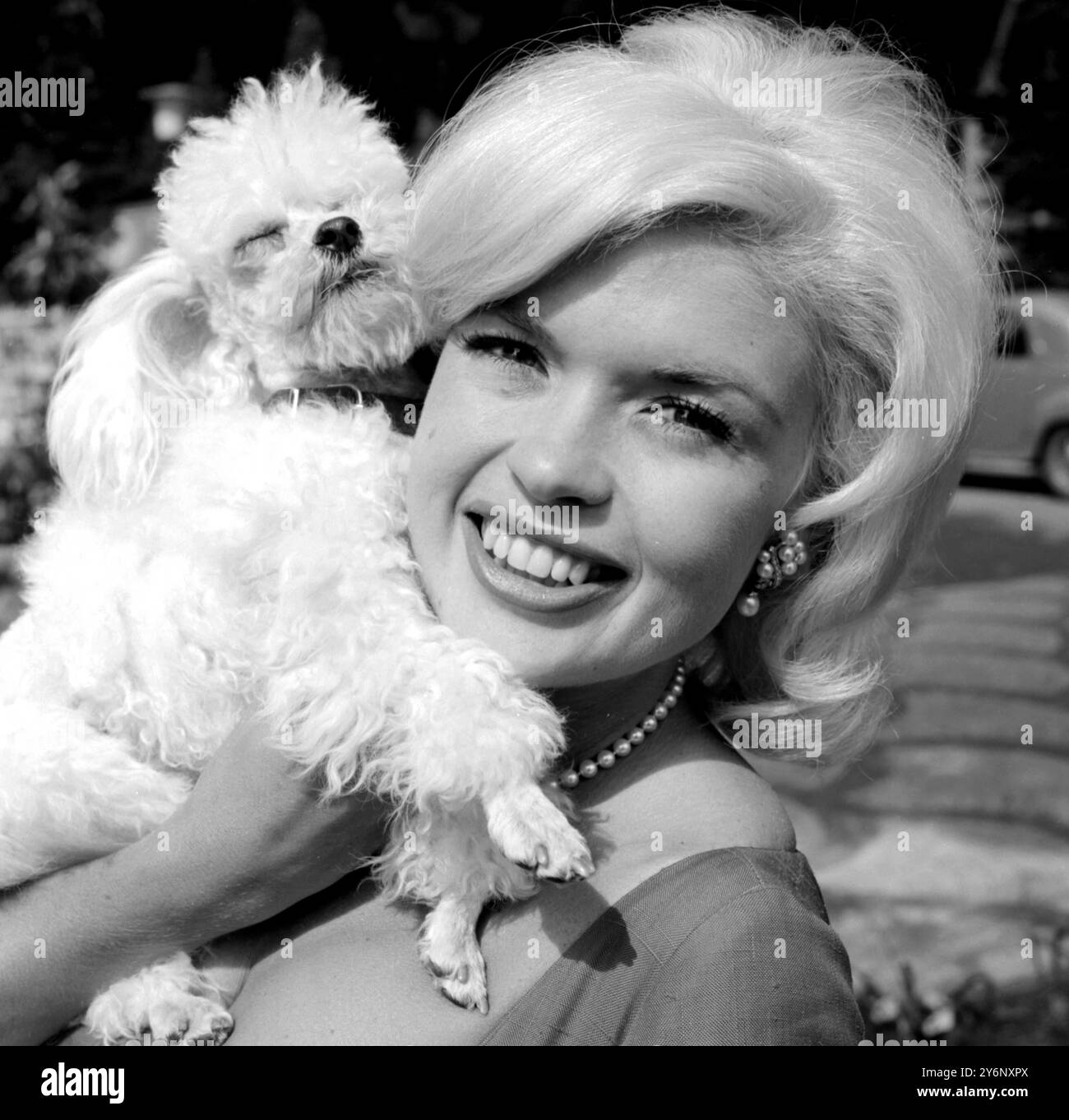 Rome, Italy: Actress Jayne Mansfield with her dog "Doctor" at the villa ...
