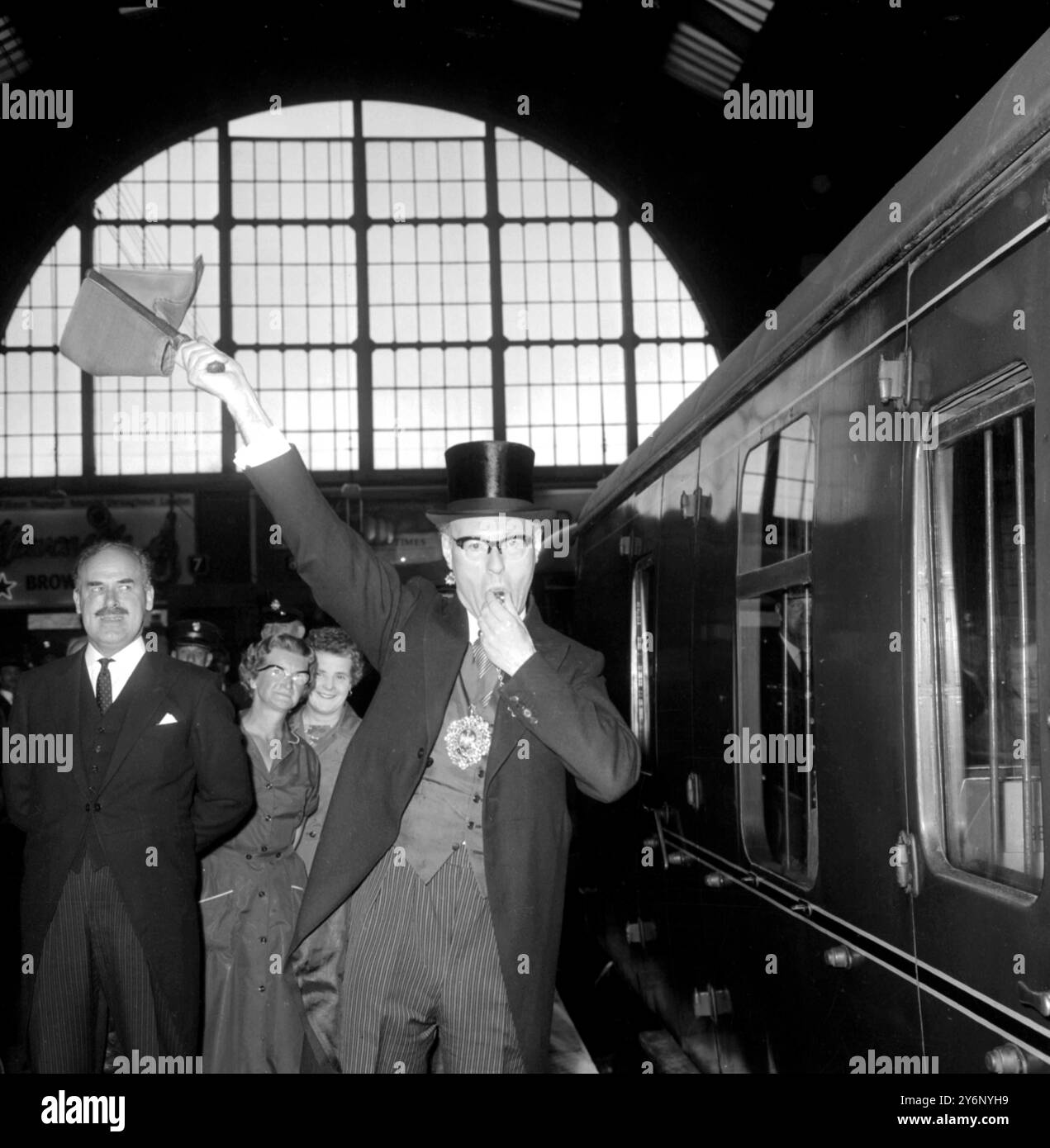 London: Lord Major of London, Sir Frederick Hoare waves flag and blows ...