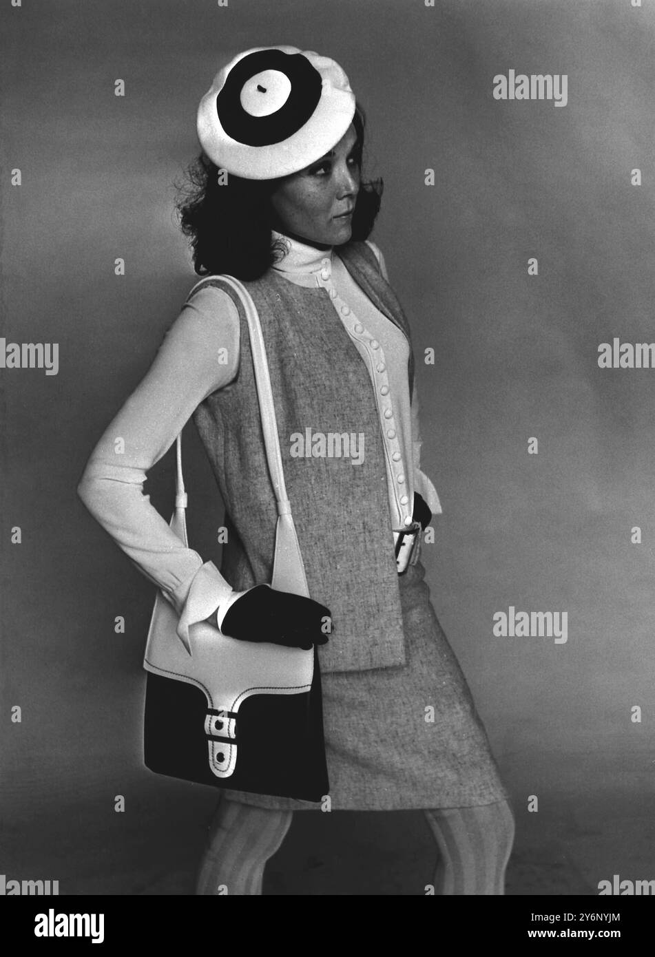 Diana Rigg plays Emma in The Avengers. Outfit called "Tutor" in grey ...