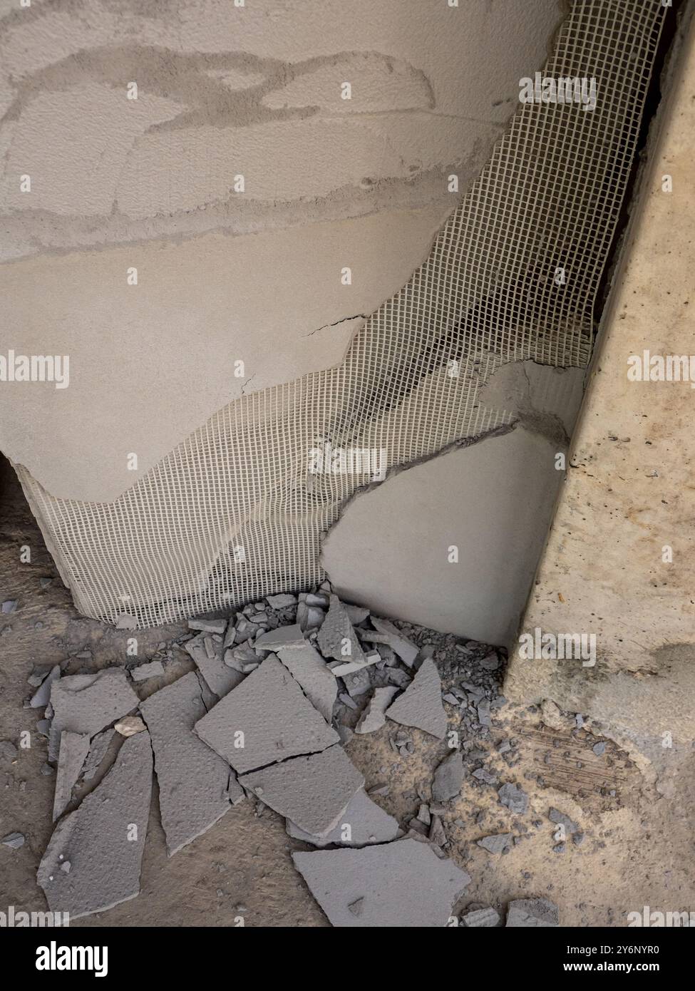 Concrete fragments and foam sheets from broken, damaged walls Stock ...
