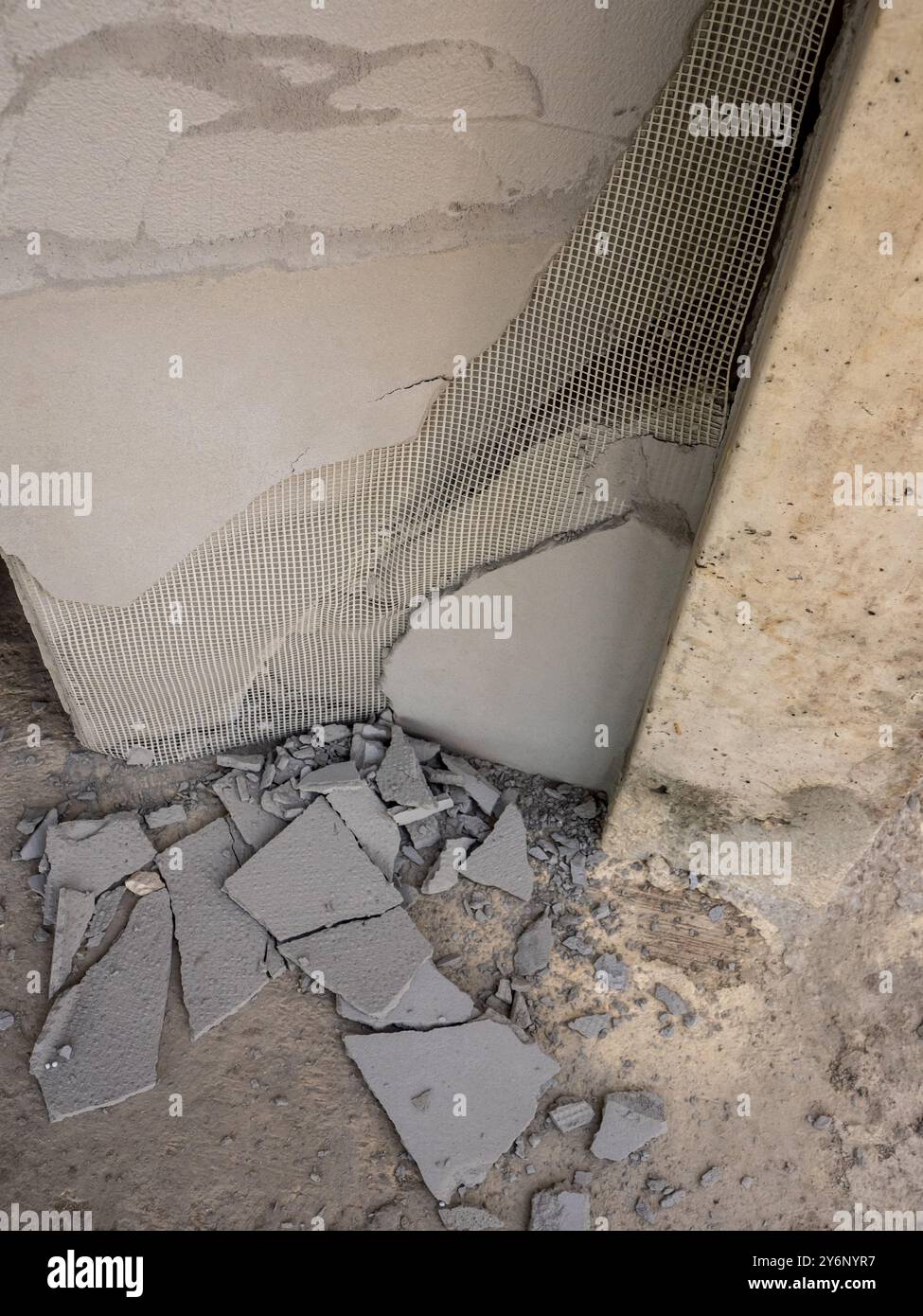 Concrete fragments and foam sheets from broken, damaged walls Stock ...