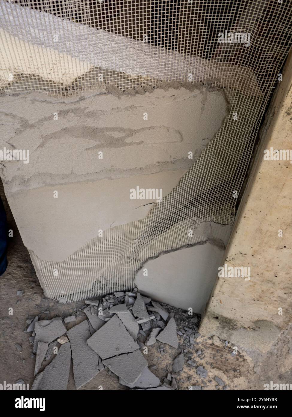 Concrete fragments and foam sheets from broken, damaged walls Stock ...