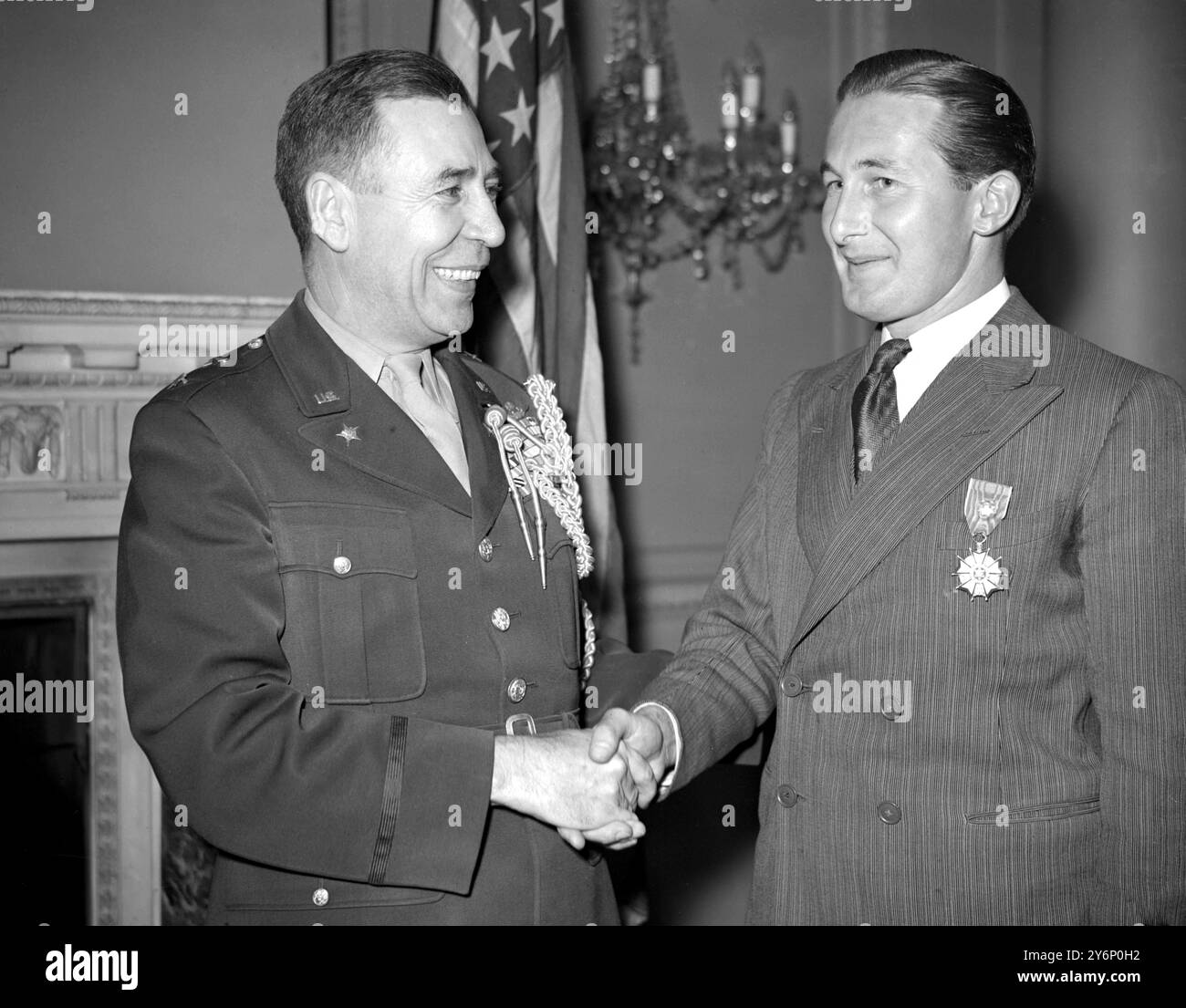 U.S. Legion of merit for Farran: Captain Farran (right) is ...
