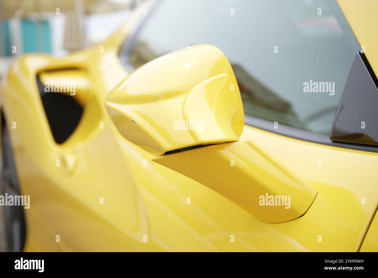 Sporty yellow luxury car, mirror close up Stock Photo - Alamy