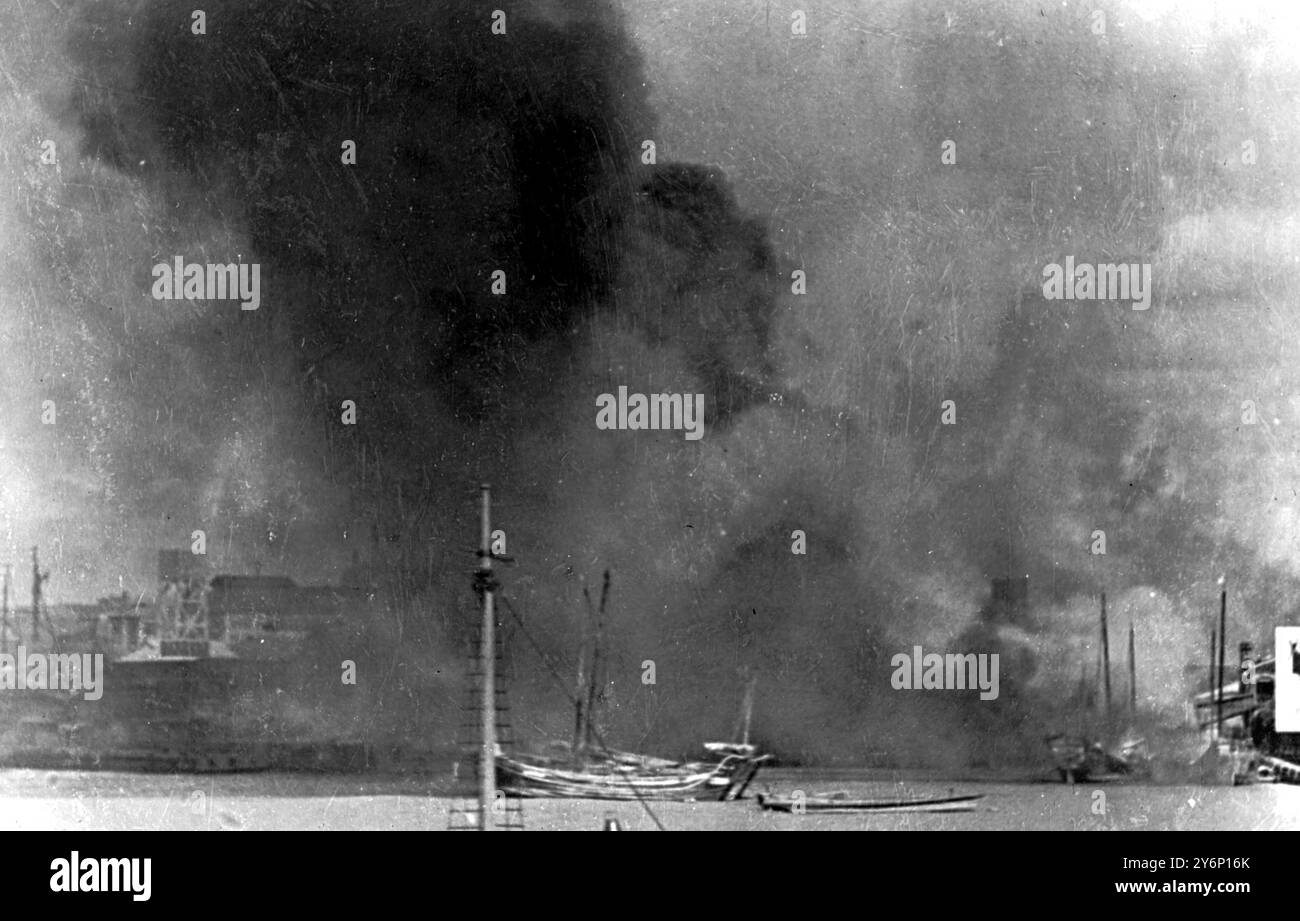 Thick clouds of black smoke rising from the big fires started in ...