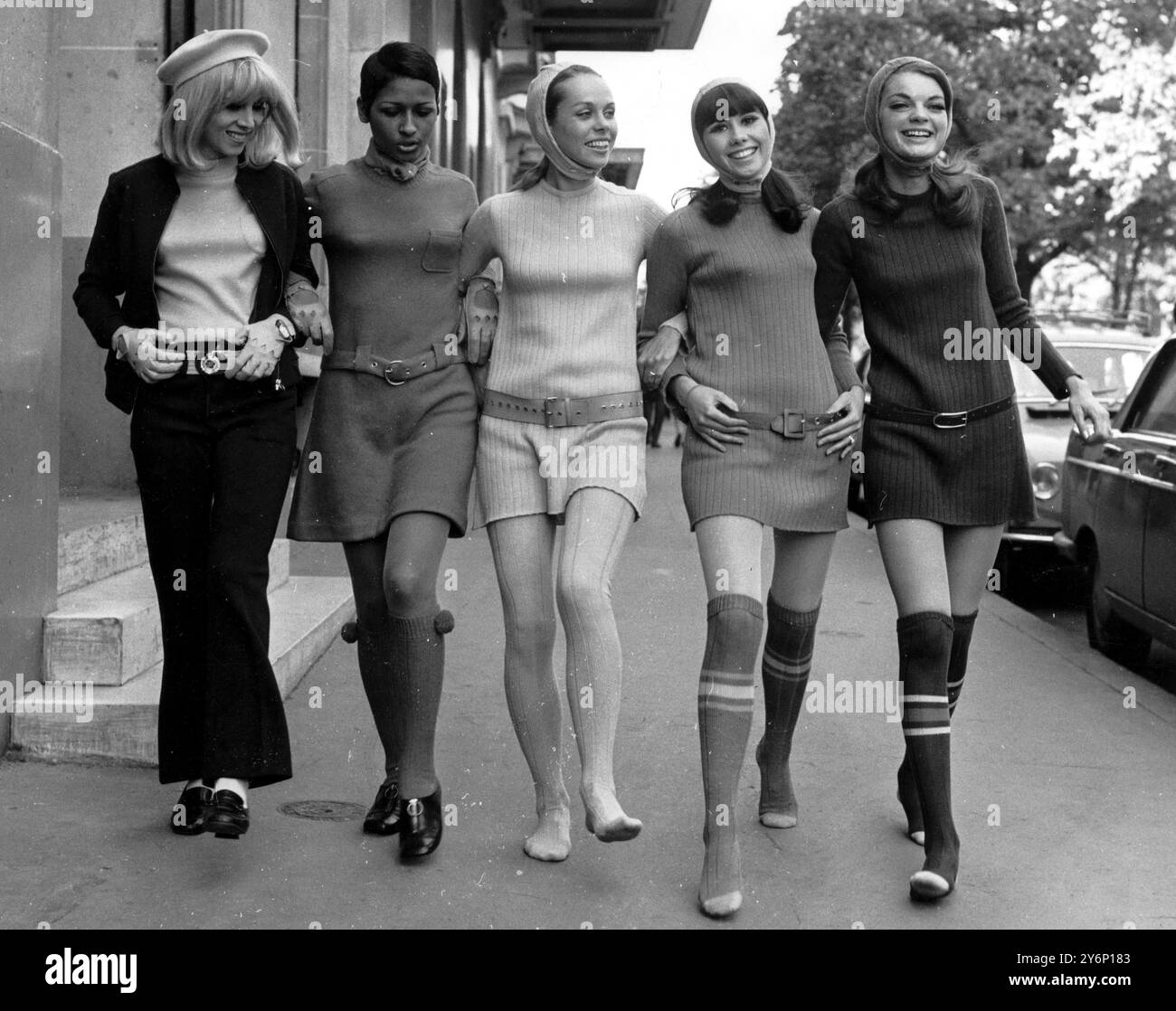 Ready To Wear models A navy blue sailor styled suit, a wool jersey dress with stockings to match ...