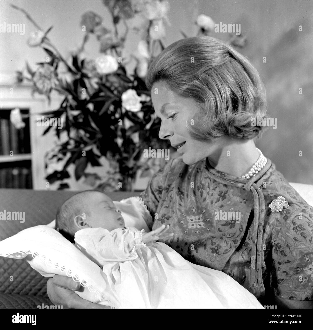 6th June 1964: The Duchess of Kent holds her new born baby daughter ...