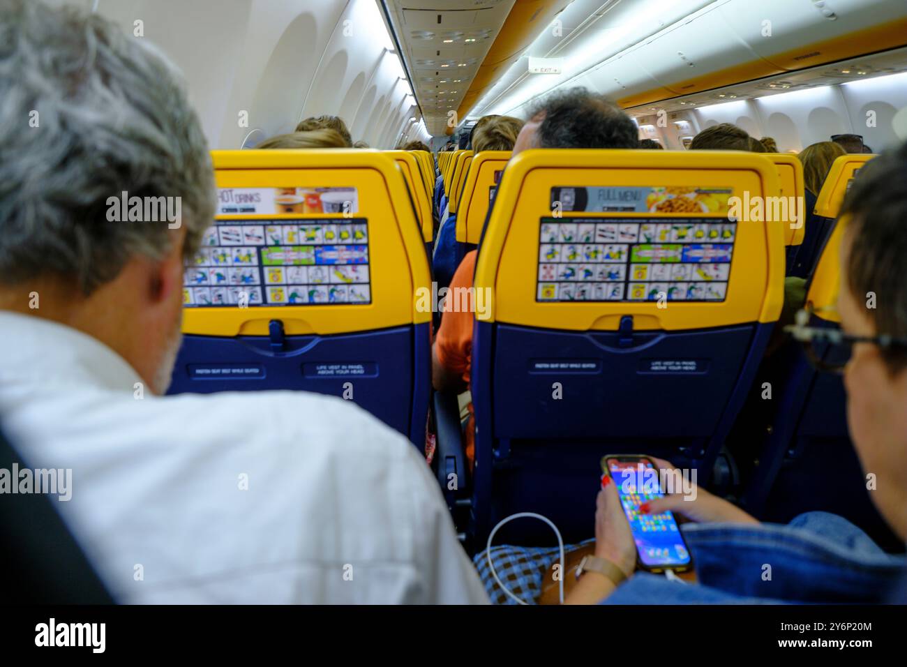 Ryanair plane. Interior view of a Boeing 737 MAX with passengers on ...