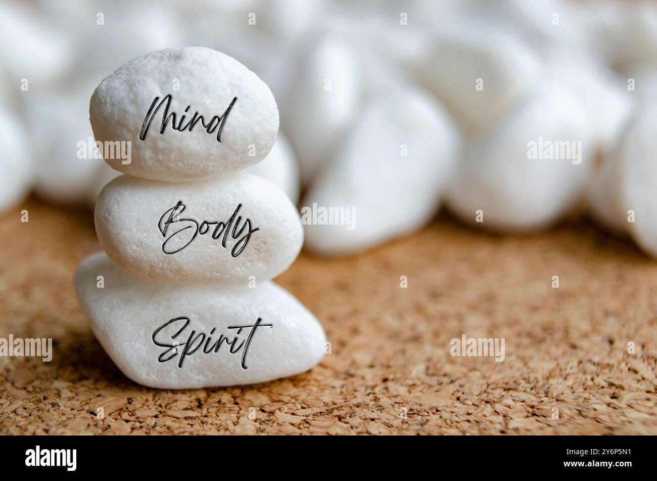 Mind, Body and Spirit text on white stones. Meditation and peace ...