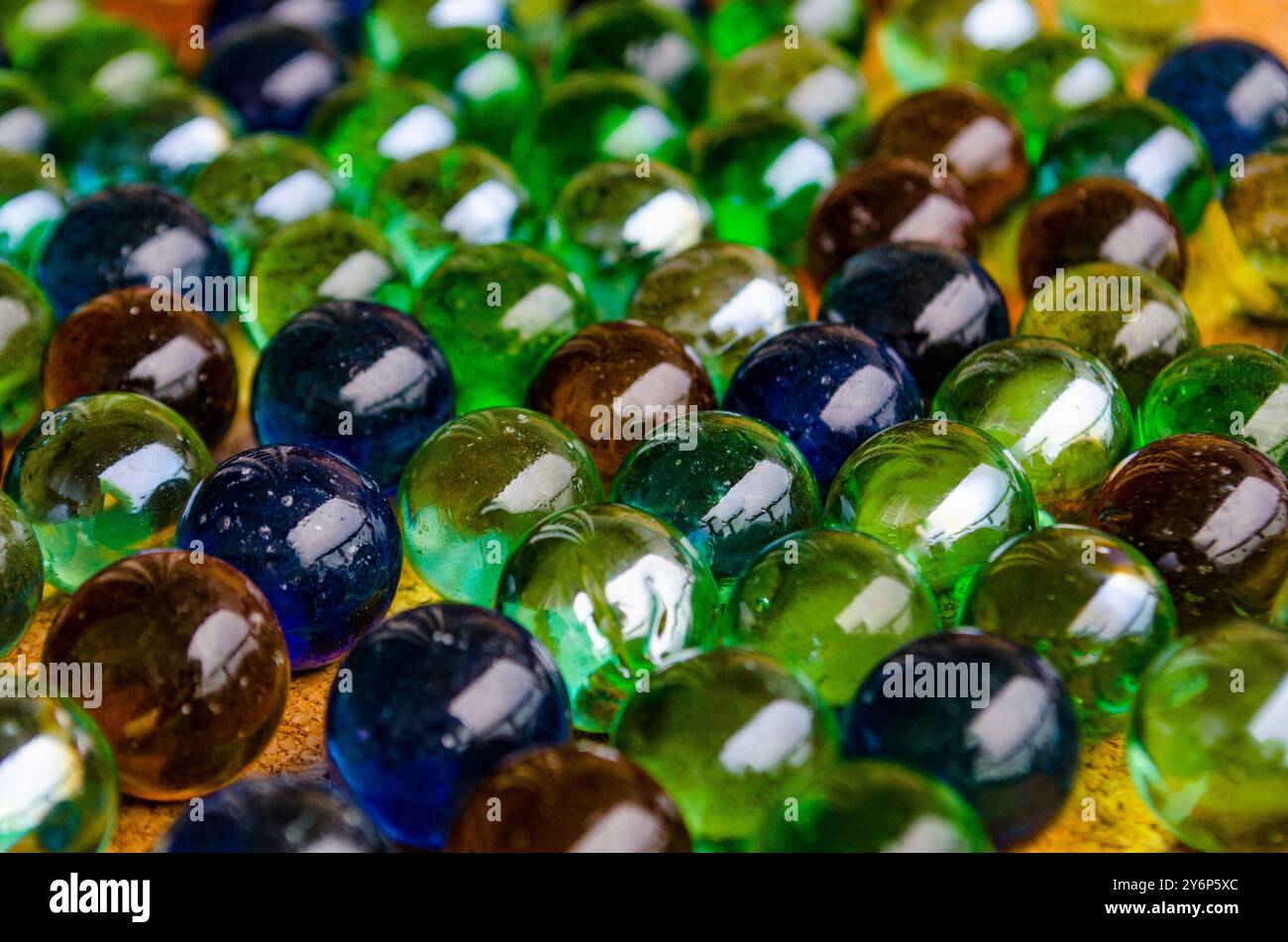 Colorful rolling marbles rainbow hi-res stock photography and images ...