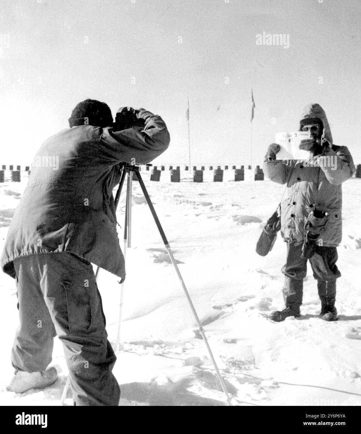 South Pole: Daily Mail reporter from London Noel Barber holds up "take ...
