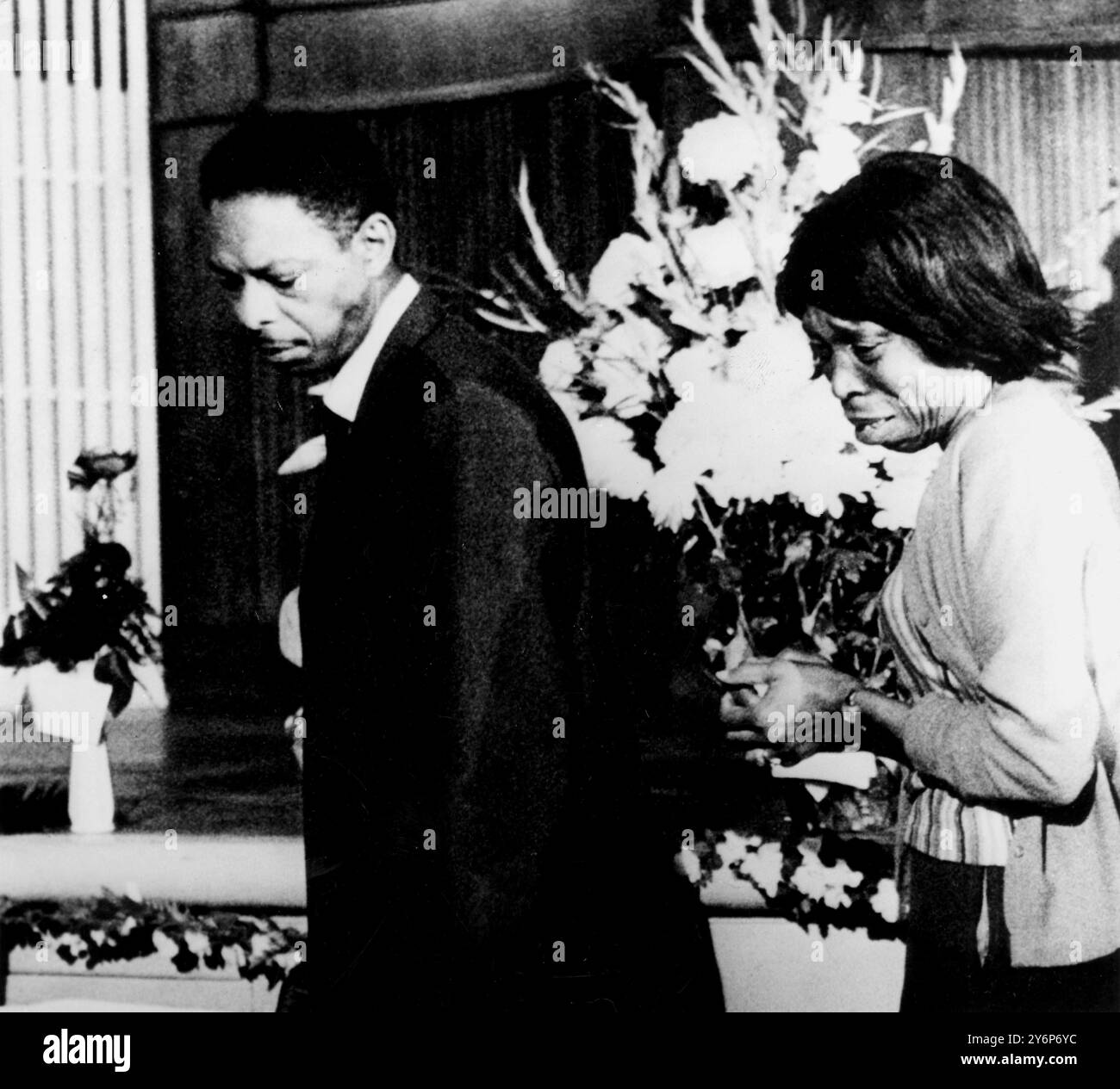 Grief stricken Afro-americans passing the body of civil rights leader ...