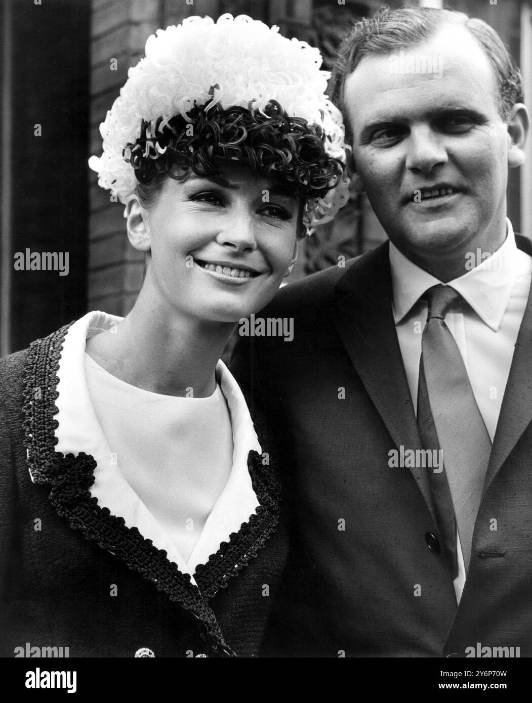 International Cover Girl Sandra Paul shose a curly-fronded hat for her ...