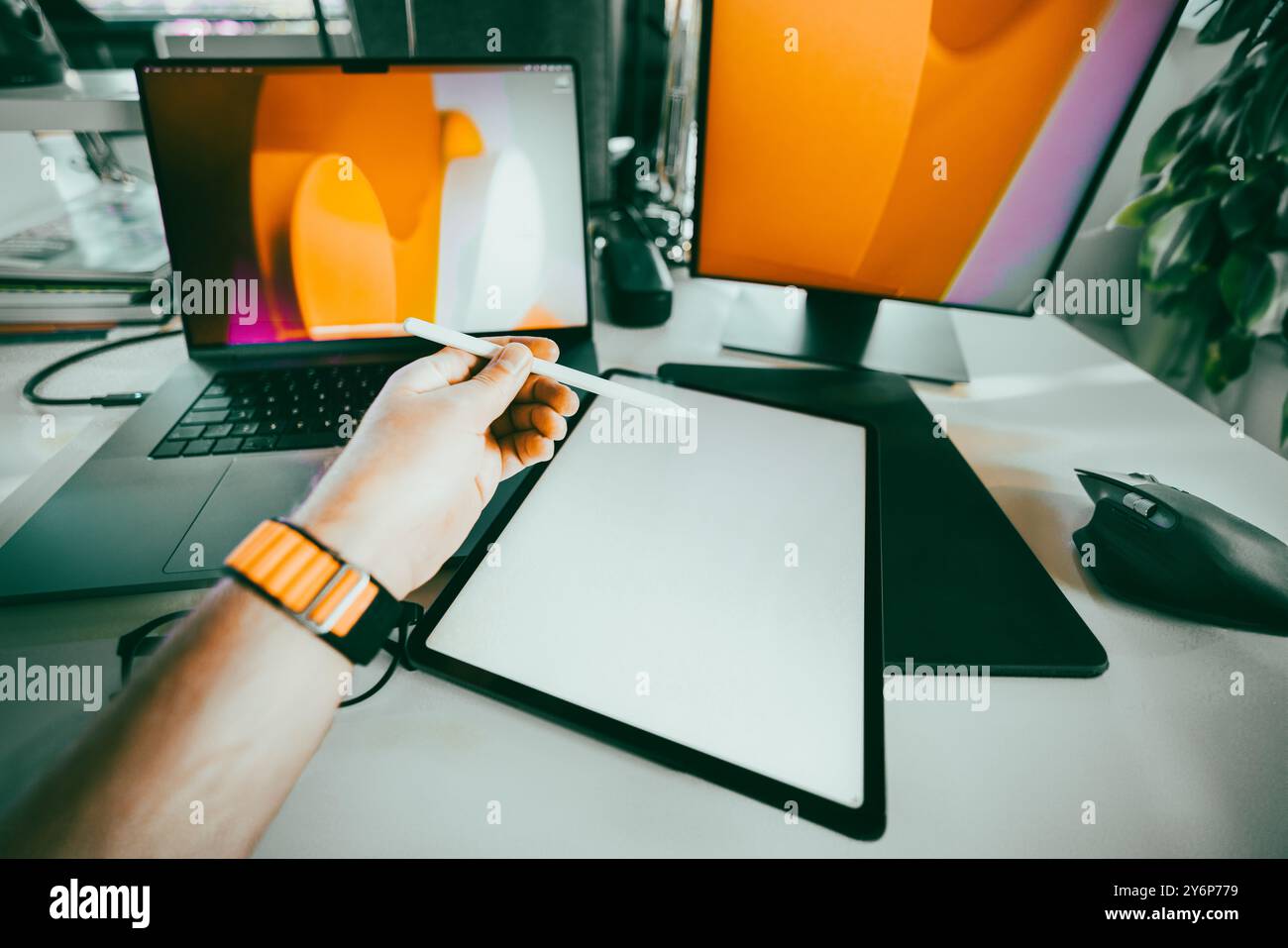 Meeting notes hand holding digital tablet stylus. Graphic tablet empty ...