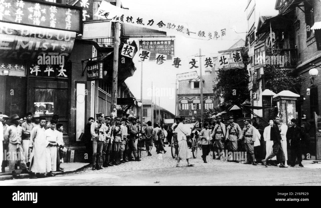 Shanghai - China Chinese troops on duty at the entrance to a ...
