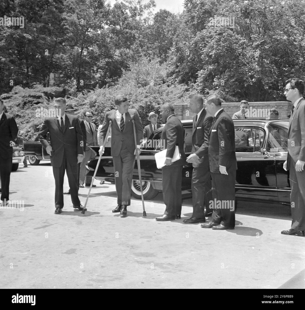 President John F. Kennedy arrives in Washington on crutches.On his ...