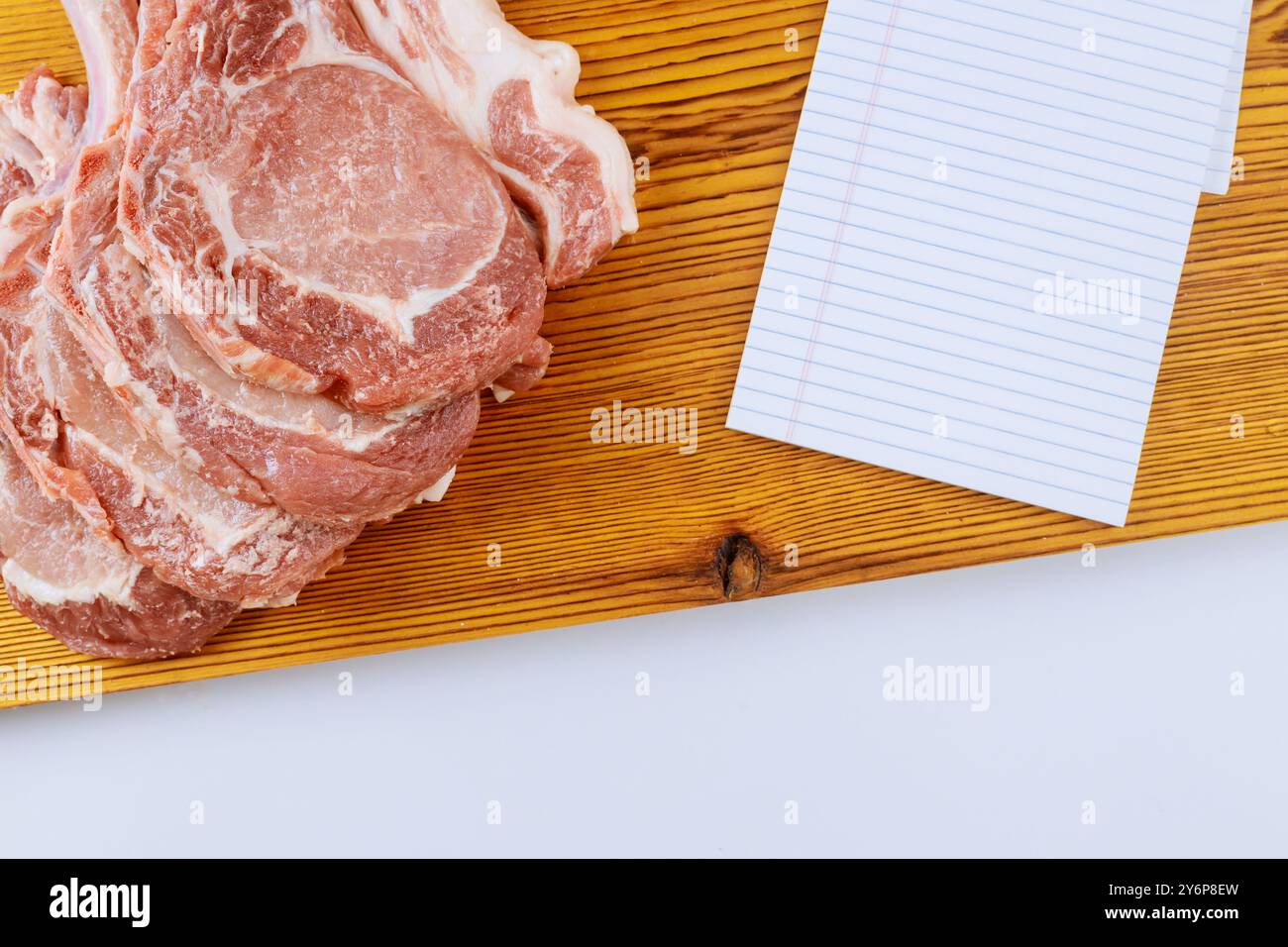 Pork portion steaks, raw ready to marinate, in row Stock Photo - Alamy