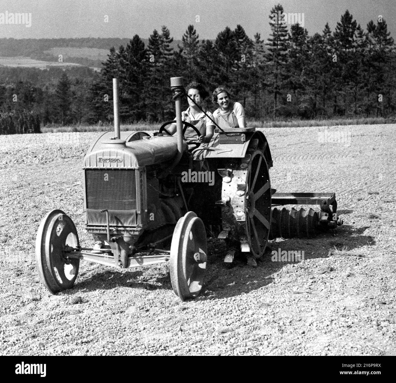 Land girls wwii tractor hi-res stock photography and images - Alamy