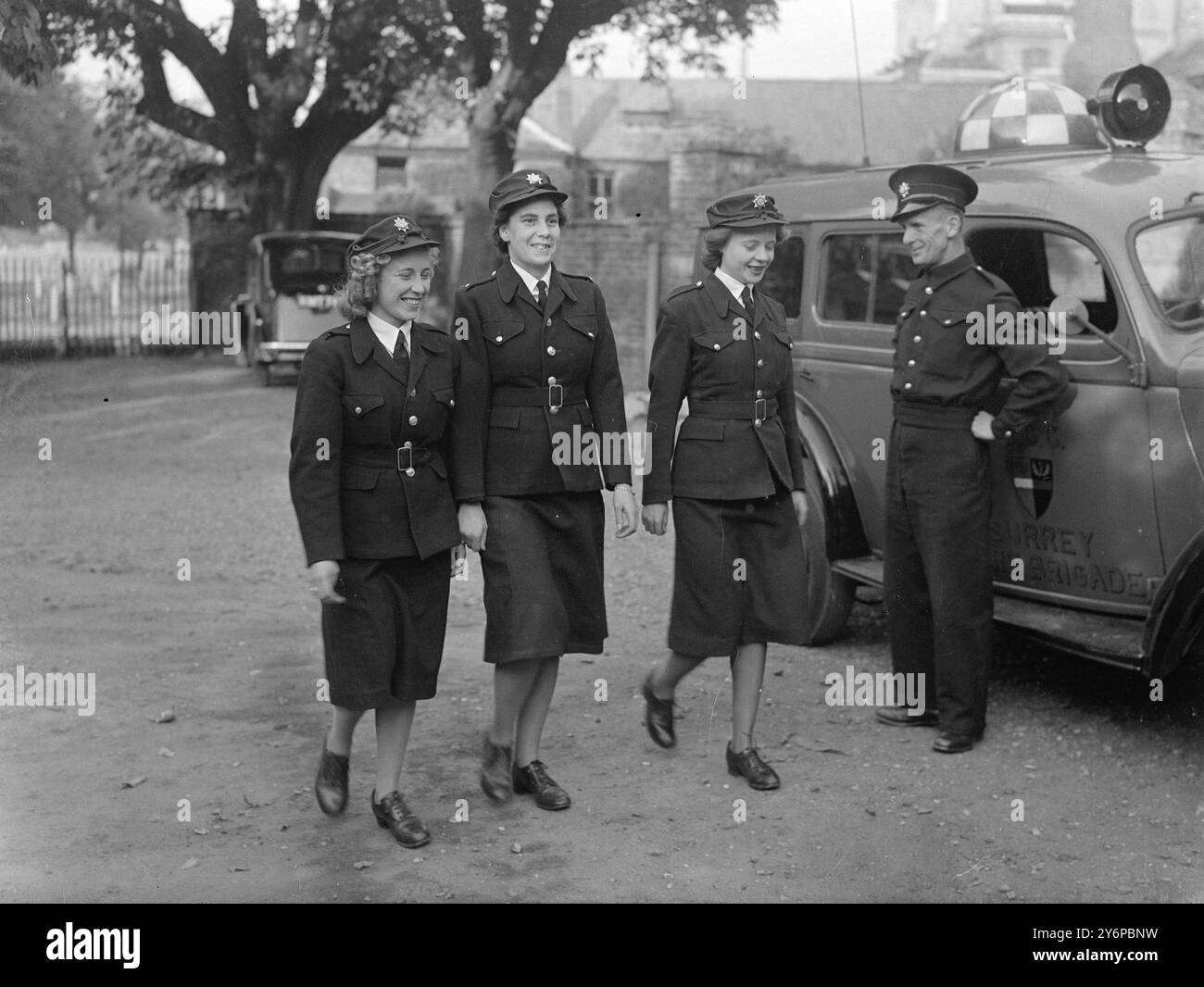 Brigade March Past A Group Of Fifteen Women Who Wear Blue Uniforms Have