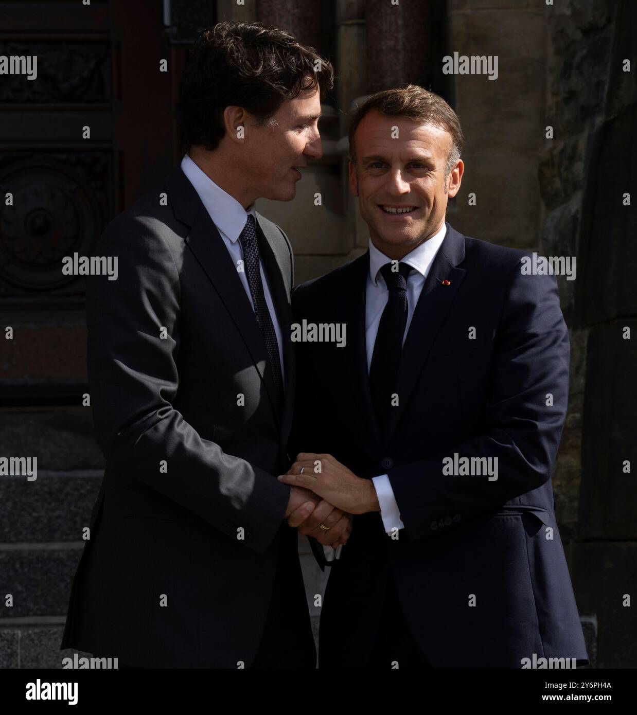 Prime Minister Justin Trudeau, left, speaks with French President ...