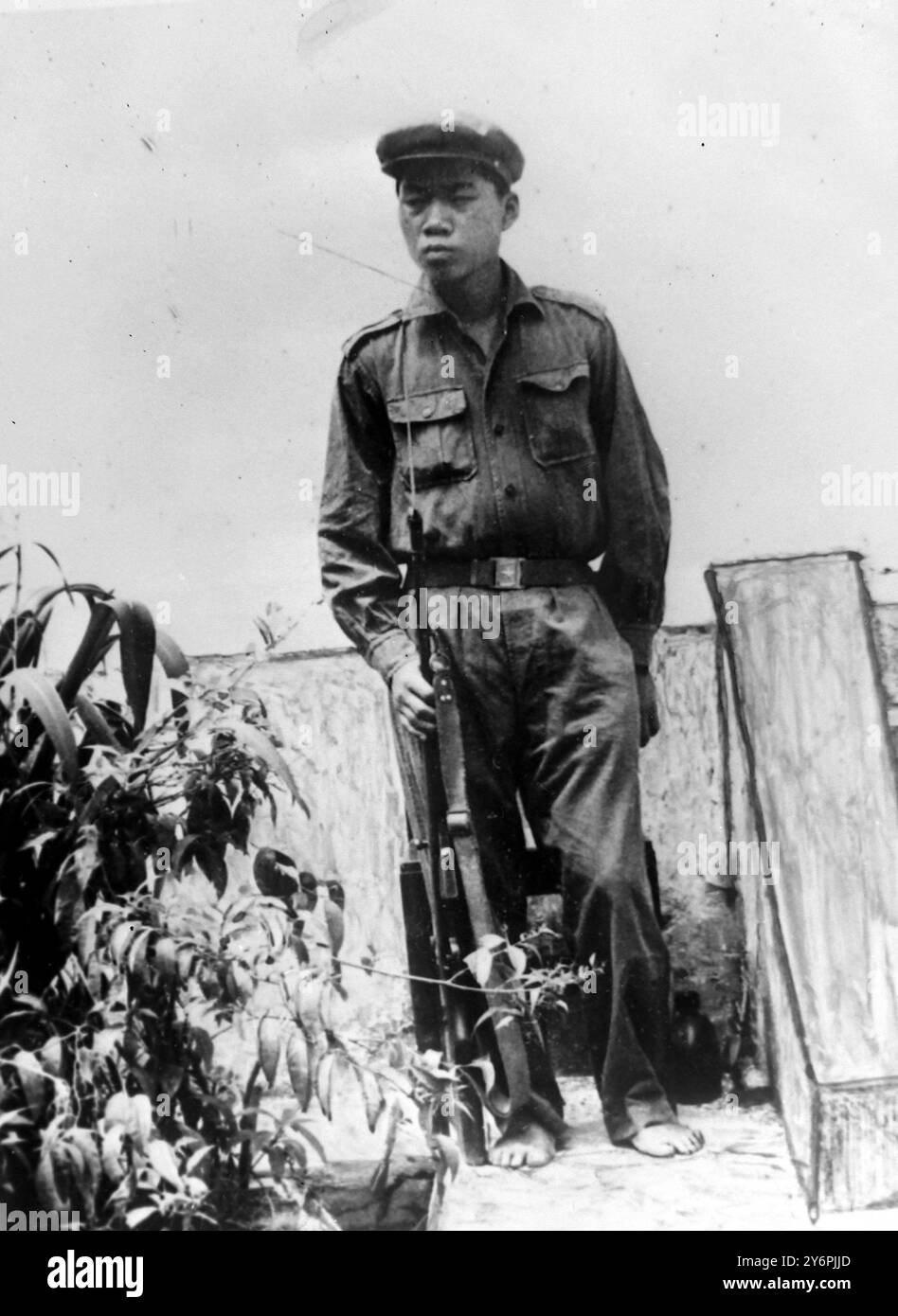 1960s soldier in uniform stands hi-res stock photography and images - Alamy