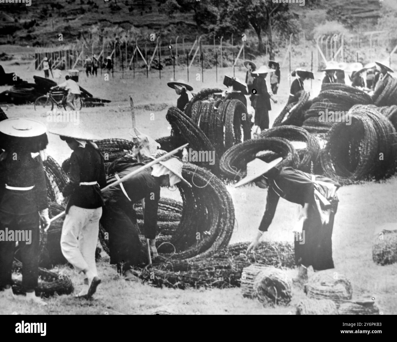 BORDER WORKERS ON SECTION OF NEW BARRIER AT FRONTIER IN HONG KONG ; 15 ...