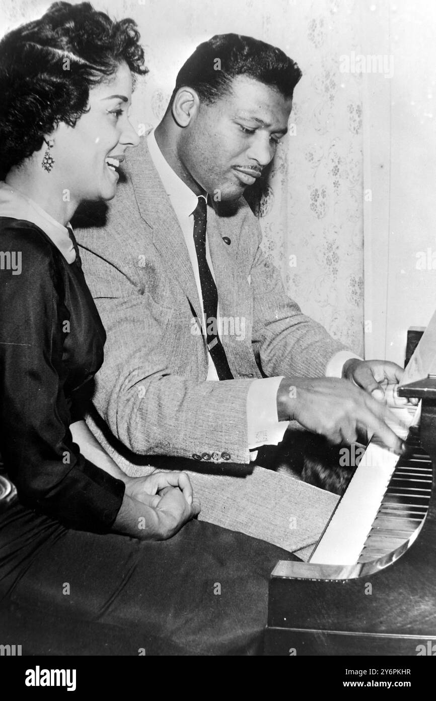 BOXER RAY ROBINSON WITH WIFE EDNA PLAYING PIANO / ; 14 AUGUST 1962 ...