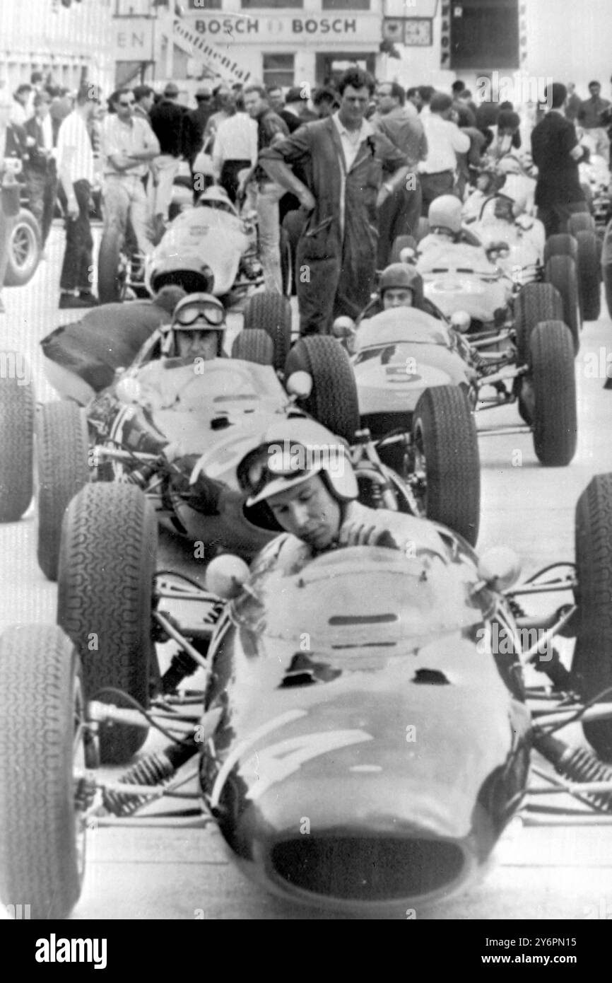 RACING DRIVERS JOHN SURTEES, ROY SALVADORI AND JIM CLARK AT MOTOR CAR ...