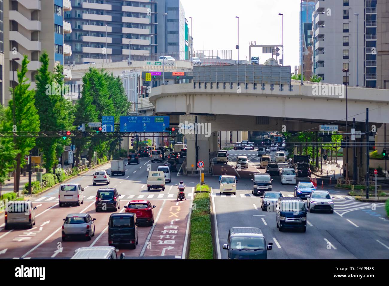 A traffic jam at the city street in Shinjuku Tokyo telephoto shot Stock ...