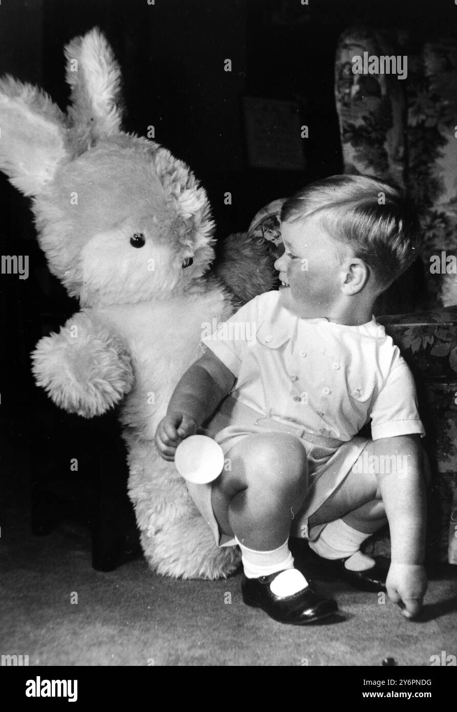 PRINCE ANDREW WITH RABBIT GIANT TOY ; 1 AUGUST 1962 Stock Photo - Alamy
