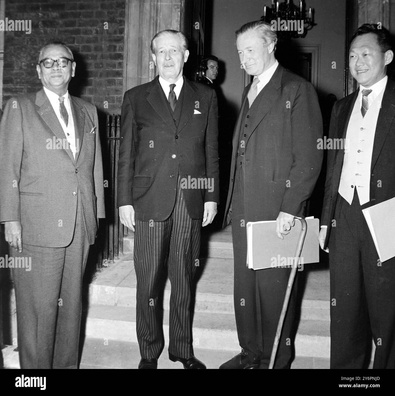 BRITISH PREMIER HAROLD MACMILLAN WITH DUNCAN SANDYS AND MALAYSIAN TUNKU ...