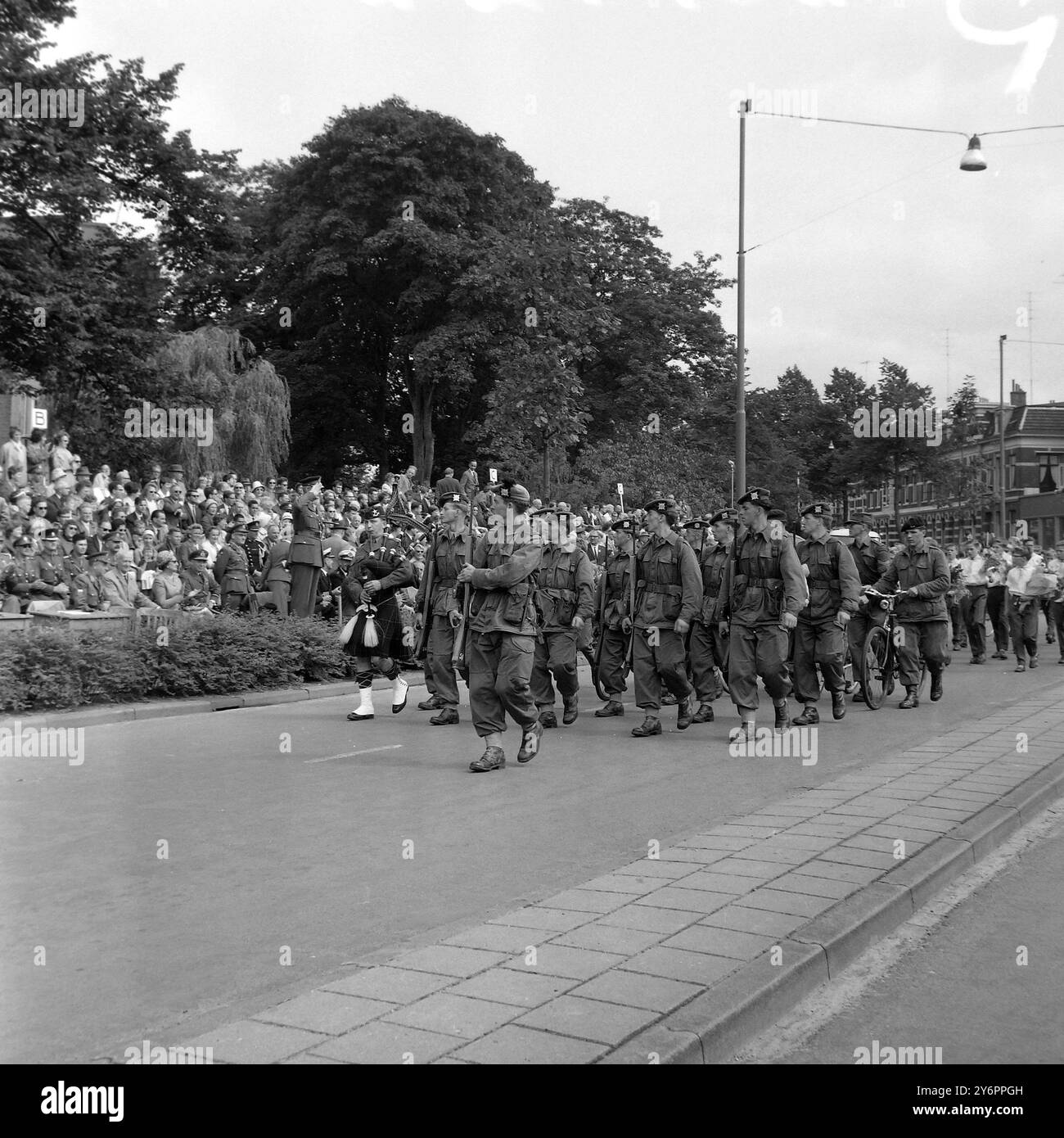 MARCH BATT OF CAMERONIANS PASS SALUTING BASE IN HOLLAND ; 29 JULY 1962 ...