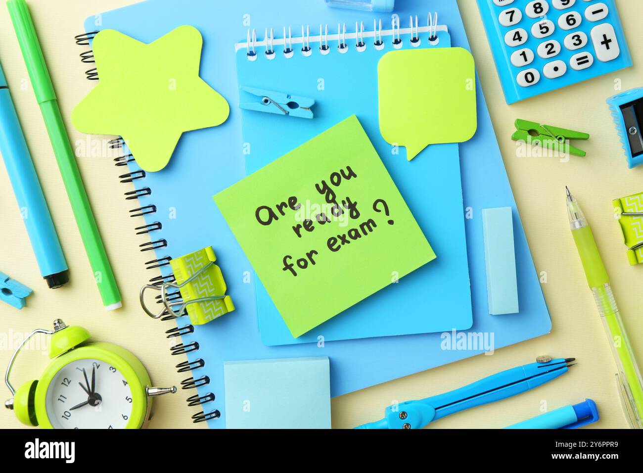 Paper note with question Are You Ready For Exam and stationery on pale ...