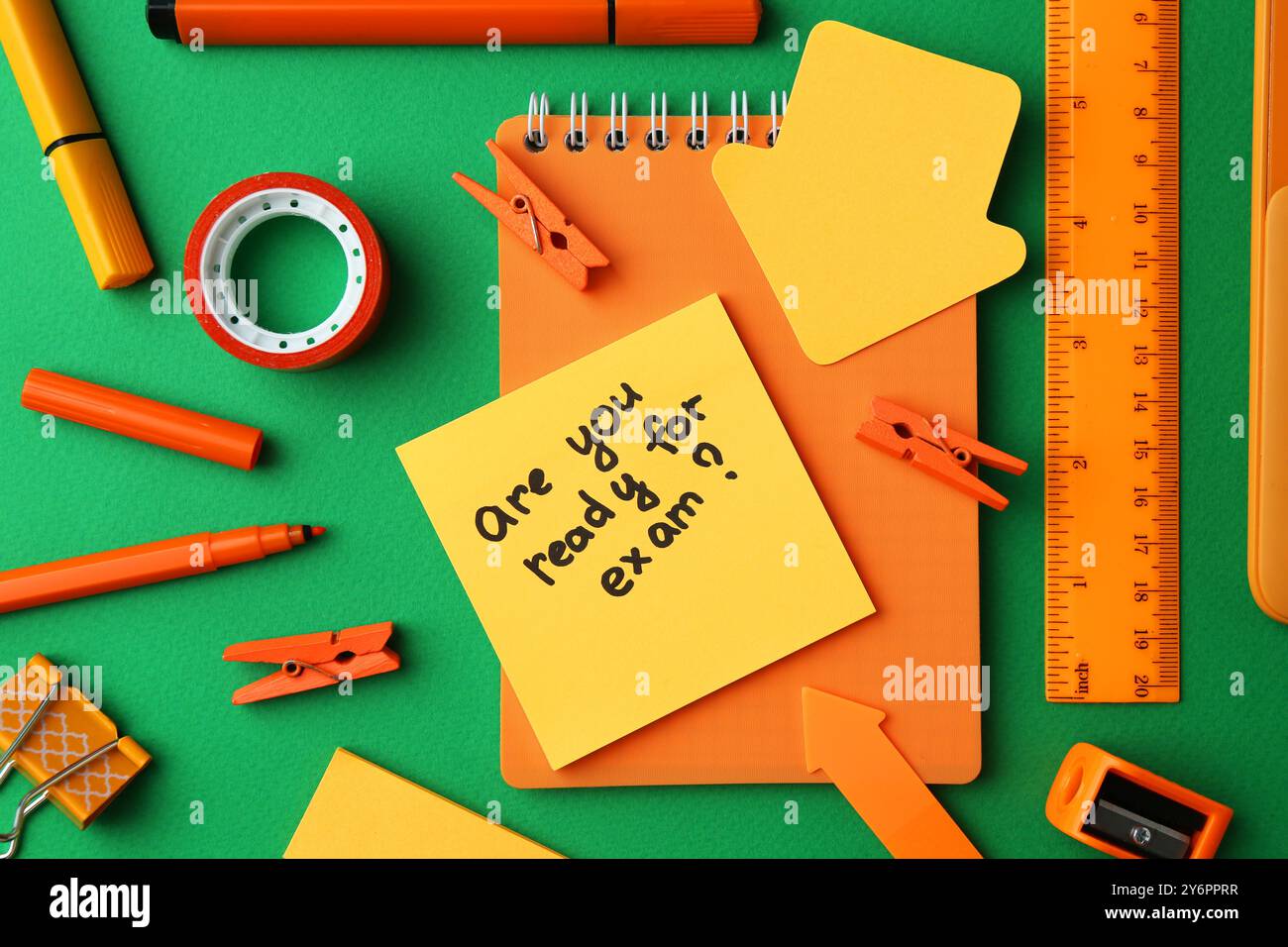 Paper note with question Are You Ready For Exam and stationery on green ...