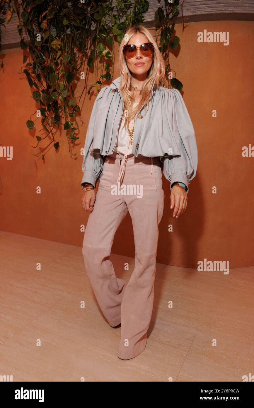 Sienna Miller attends the Chloe Spring/Summer 2025 collection presented ...