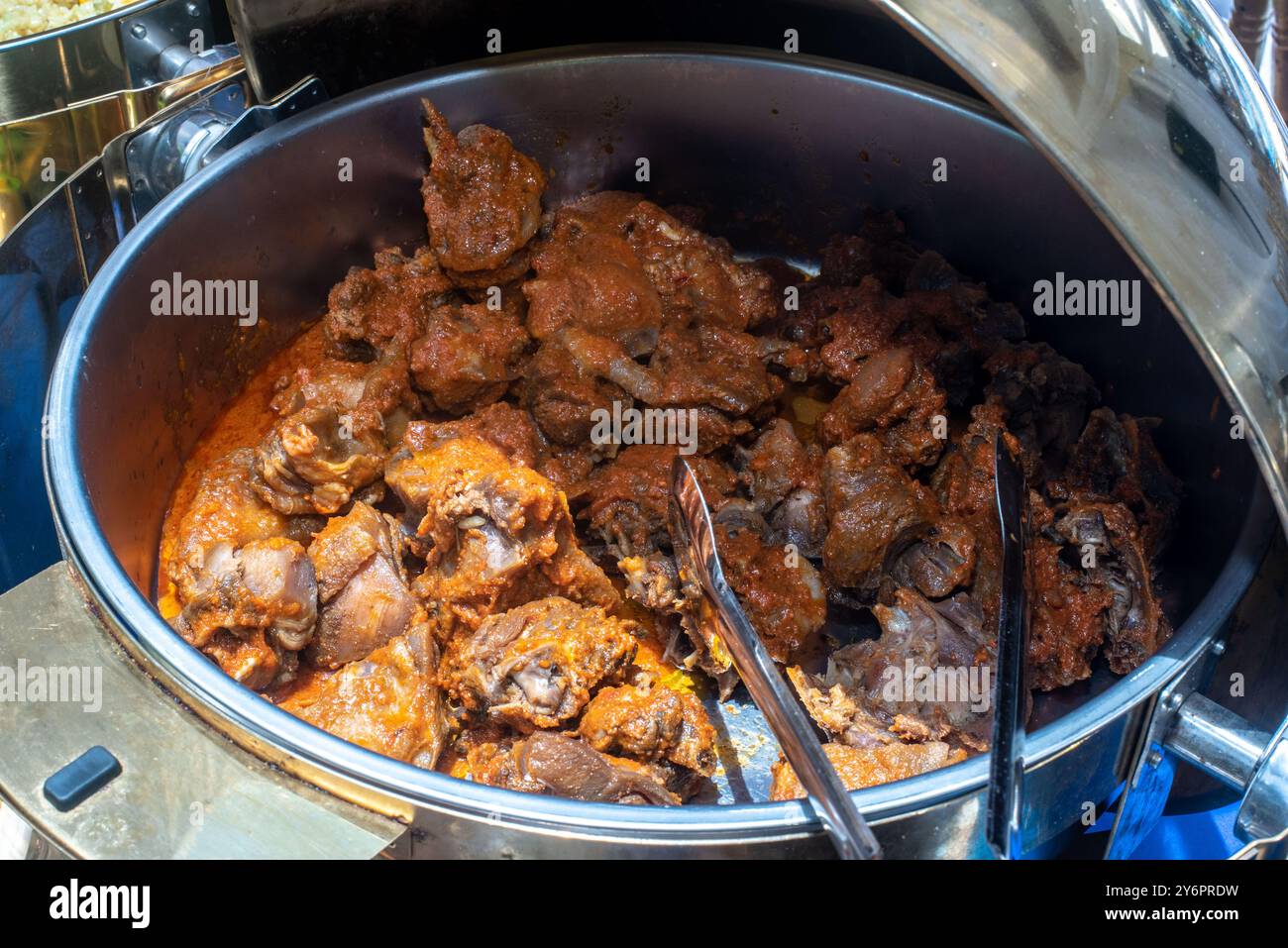 Grilled party chicken mixed with stew for guest at a birthday party in ...