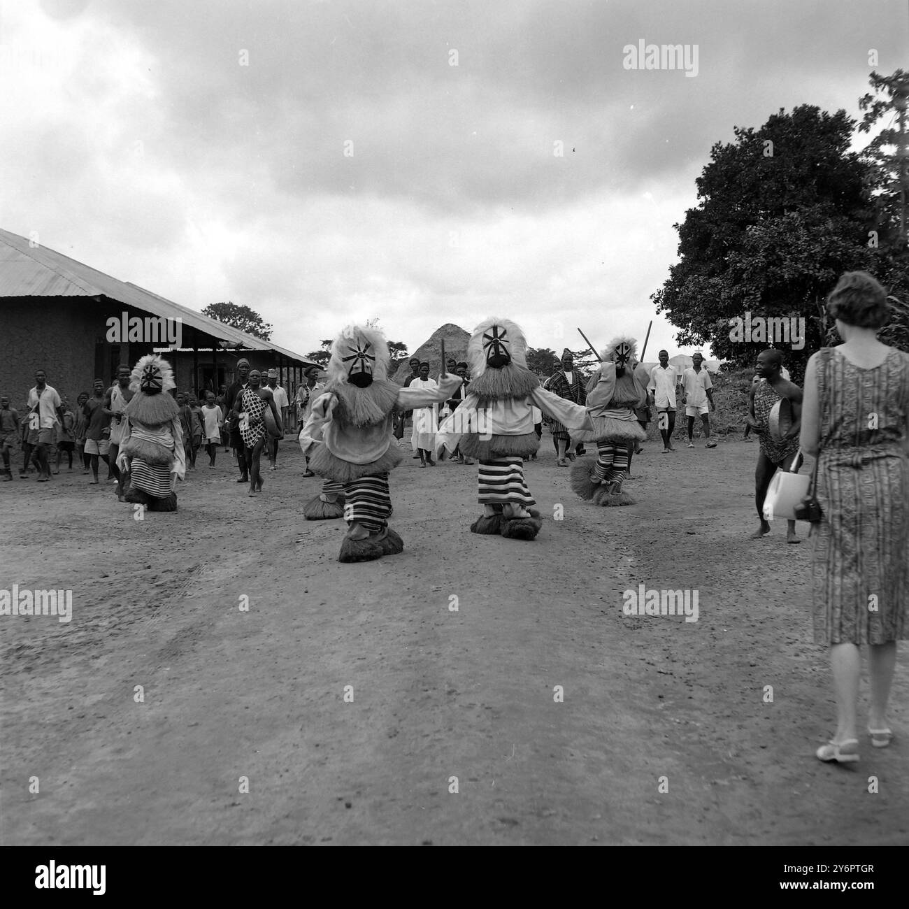 DEVIL DANCE DANCERS IN SIERRA LEONE ; 21 JULY 1962 Stock Photo - Alamy