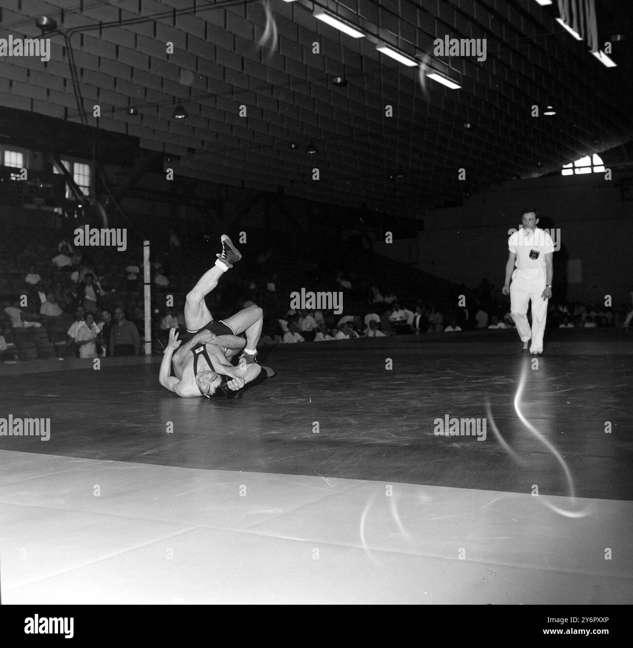 WRESTLING IN ACTION - KURT BURHAN B SAKURAMA KAYA / ; 2 JULY 1962 Stock ...