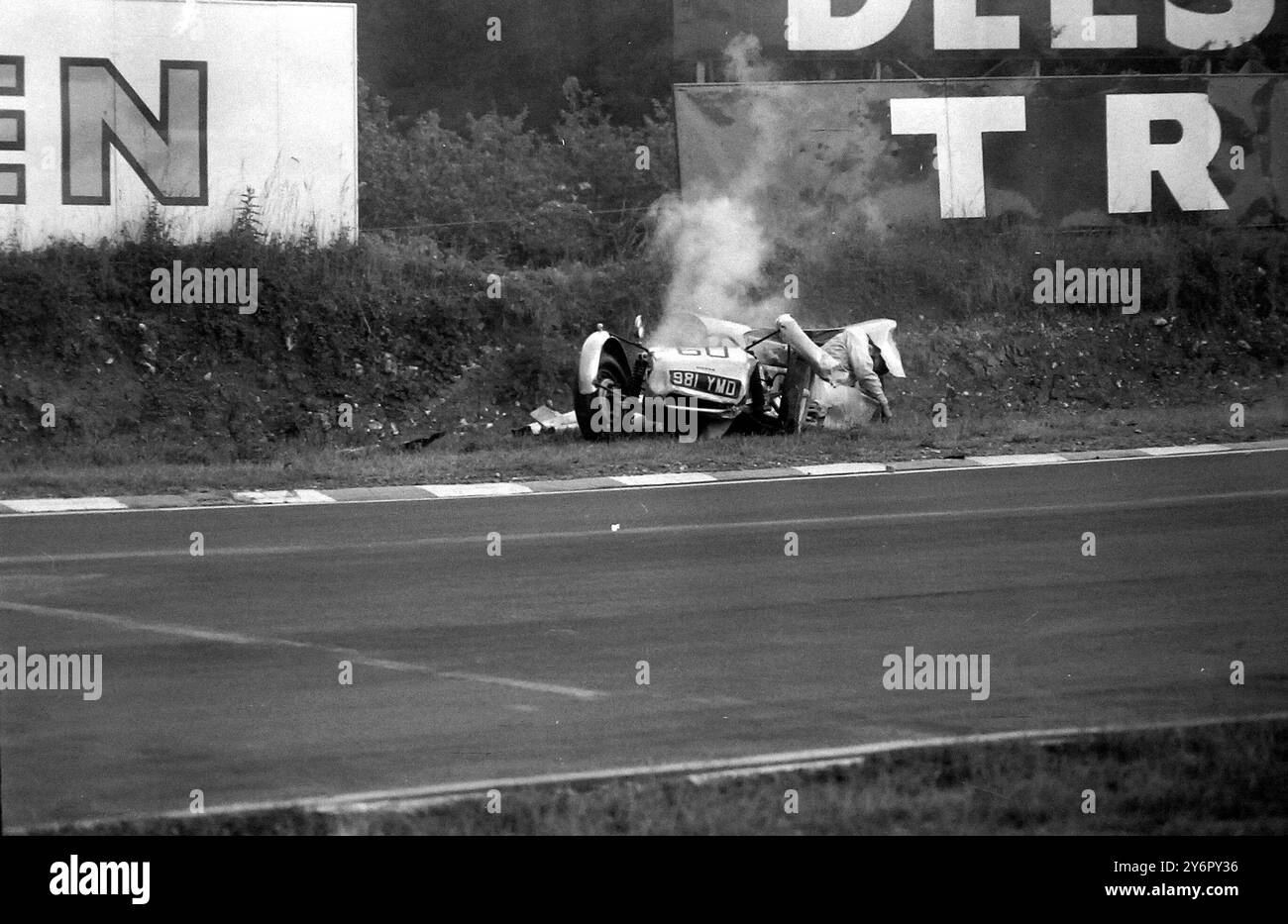 MOTOR CRASH ARM OF DRIVER PETER RHODES HANGS IN CAR NIMROD AT BRANDS ...
