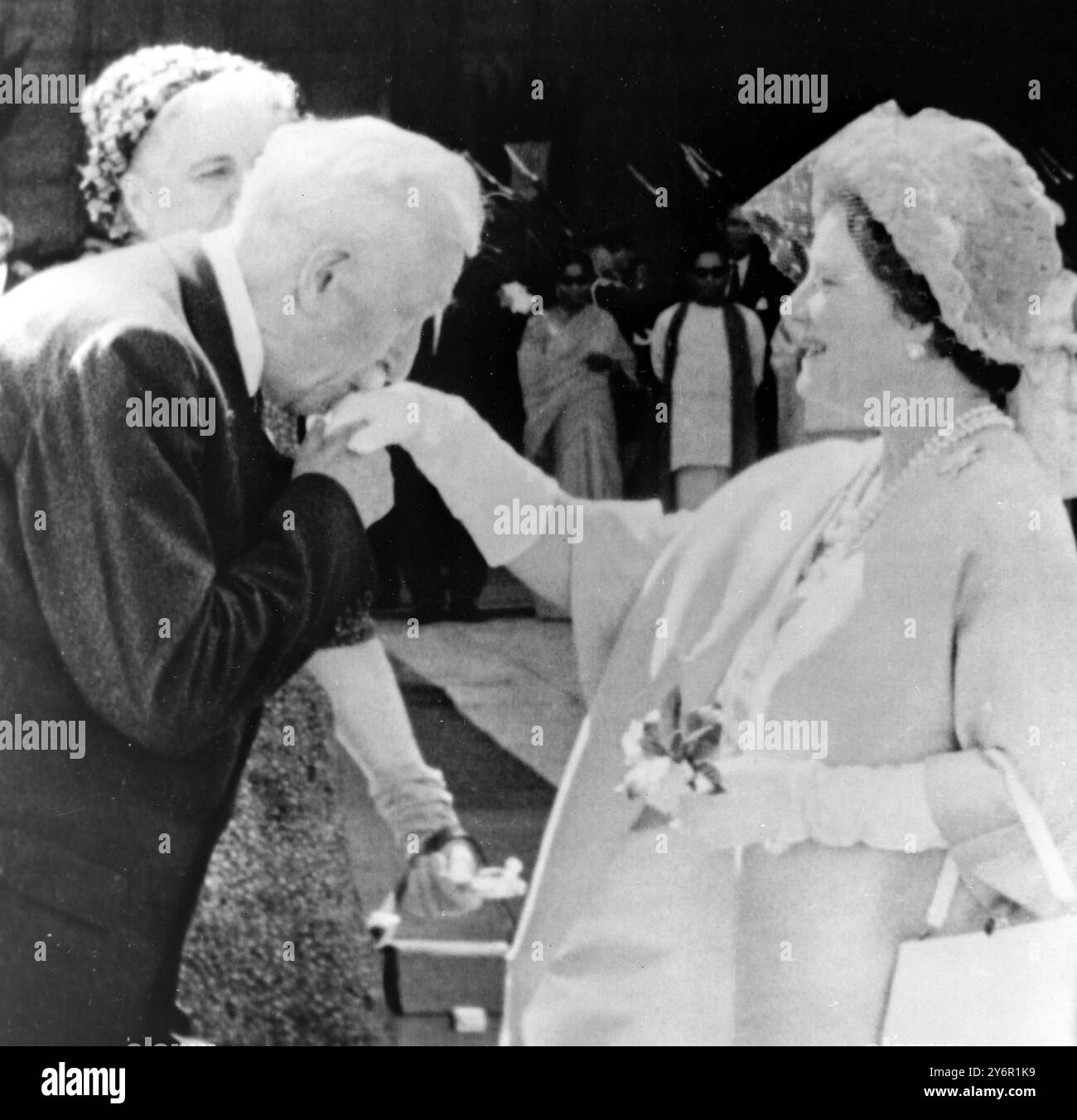 ELIZABETH THE QUEEN MOTHER WITH GEORGE VANIER WHO KISSES HER HAND IN ...