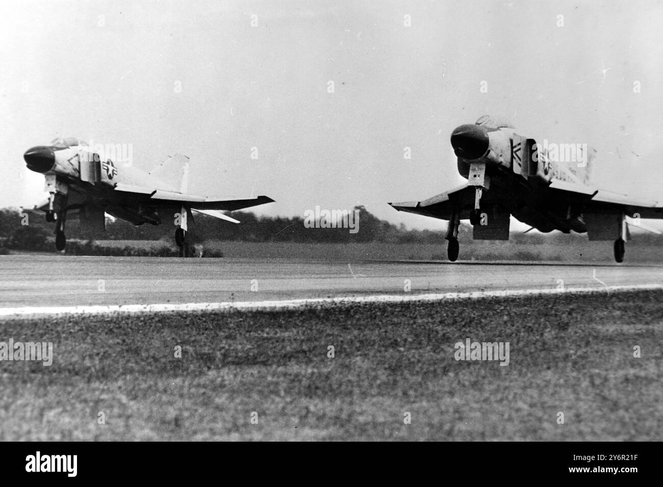 Flaps down, two American F-110A Phantom jet aircraft, the fastest in ...