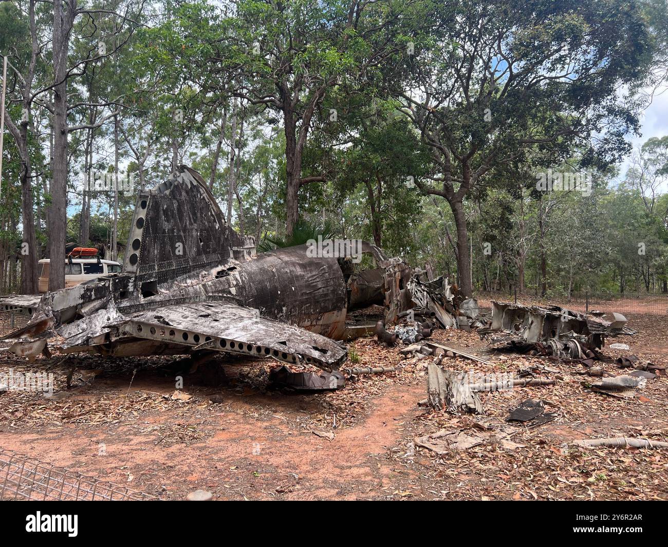 A plane wreck (Bamaga DC3 Aircraft Crash Memorial) in a forest on the ...