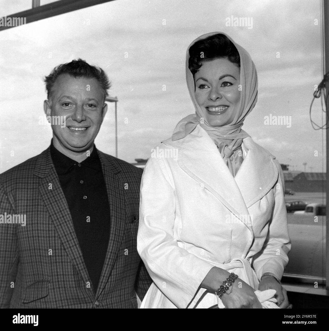 ANNE HEYWOOD WITH HUSBAND RAYMOND STROSS AT LONDON AIRPORT / ; 23 MAY ...