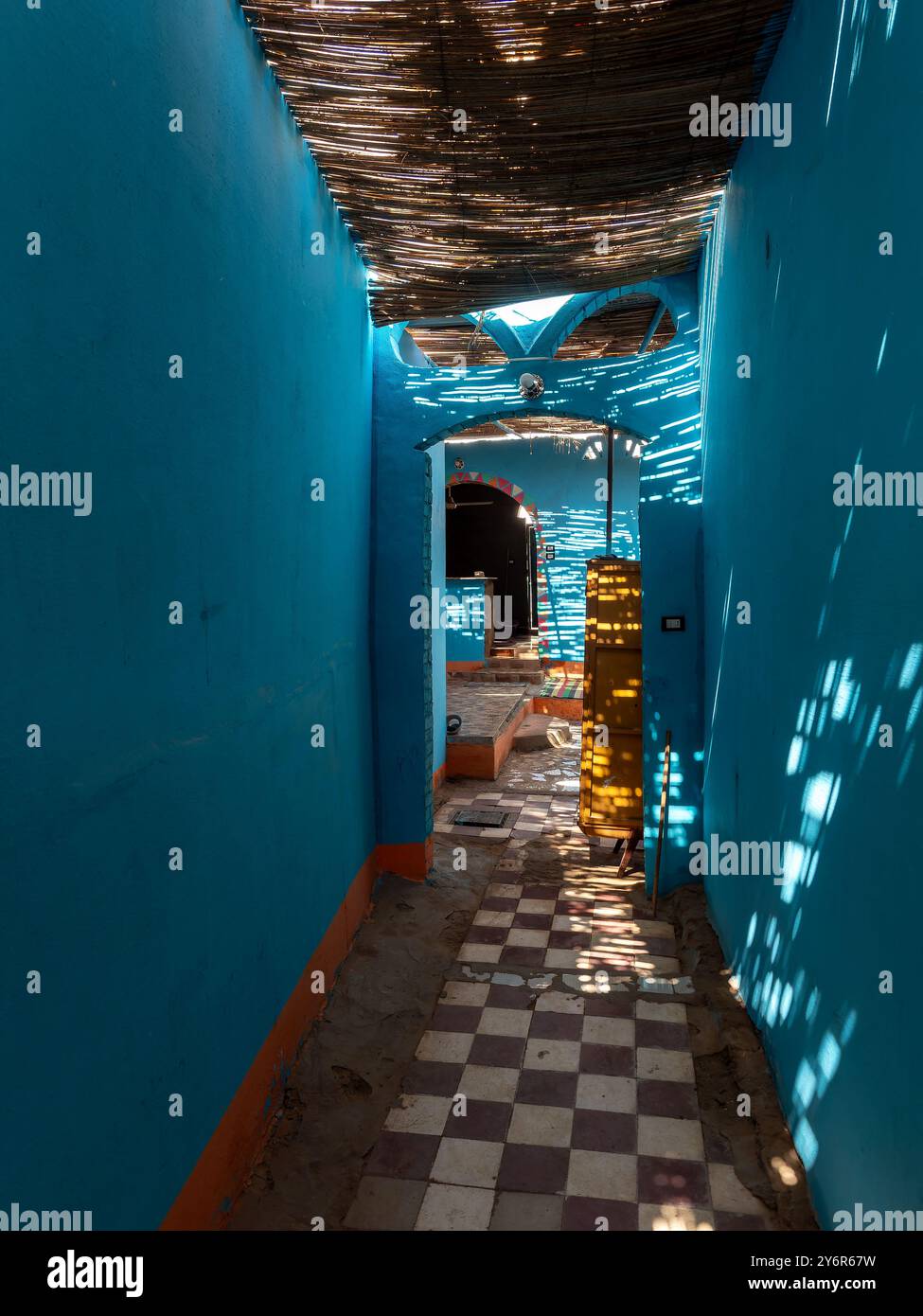 A row of colorful buildings and houses of the ancient Nubian people on ...